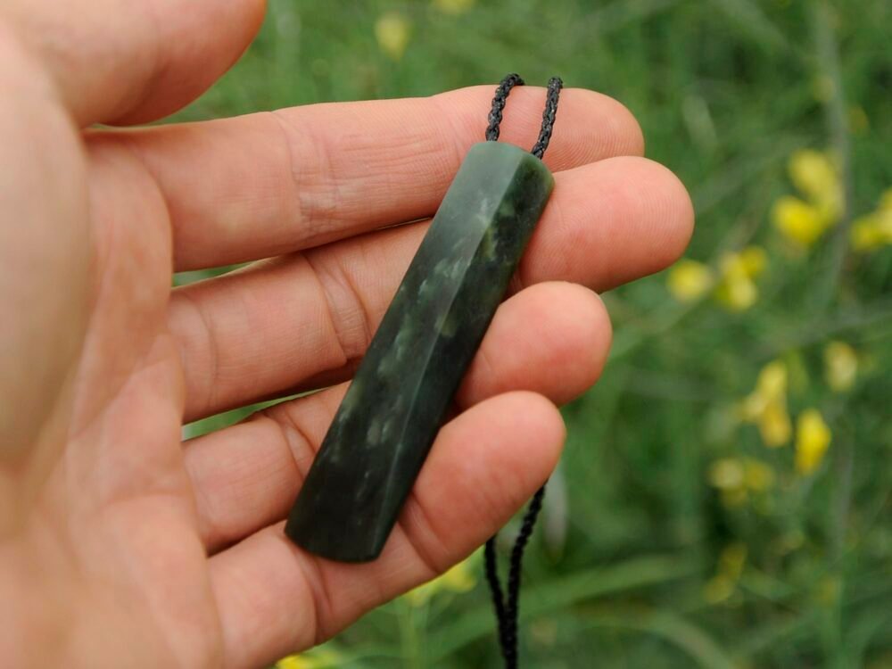 Chatoyant Inanga Pounamu Toki — A Carved Piece