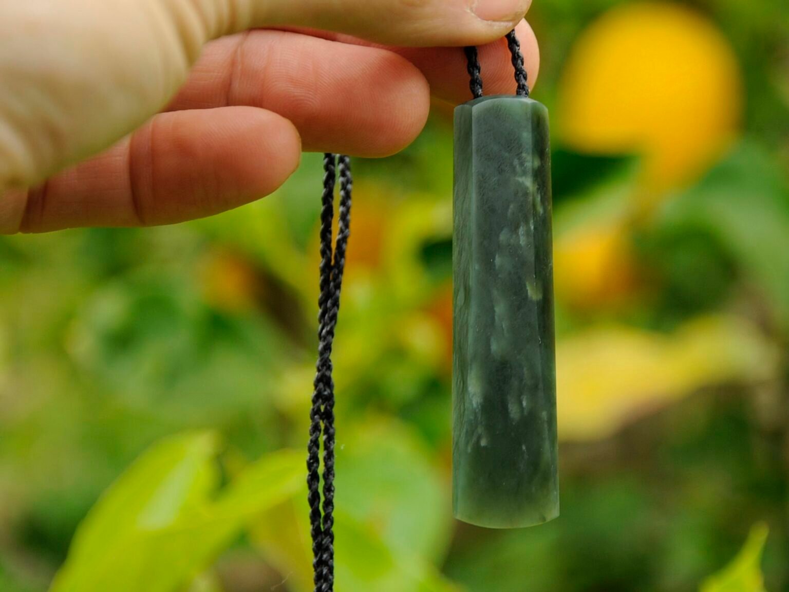 Chatoyant Inanga Pounamu Toki — A Carved Piece